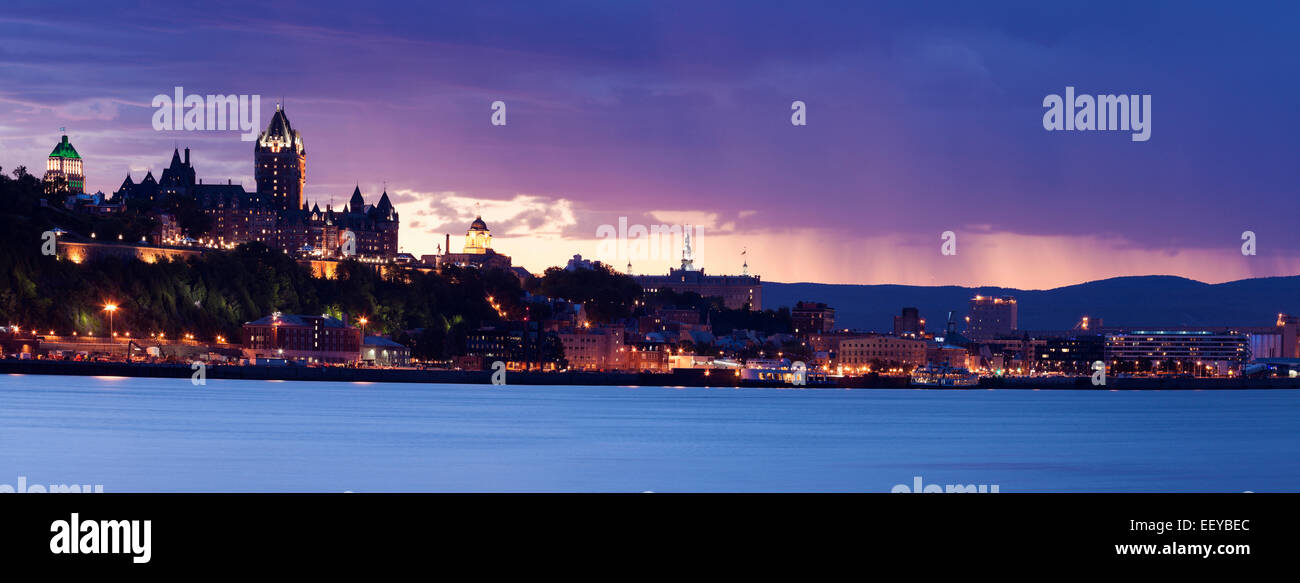 Canada, Quebec, Quebec City, Cityscape with river and mountains on ...