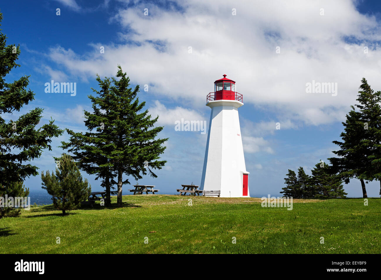 Canada, Nova Scotia, Cape George Lighthouse on grassy hill Stock Photo ...