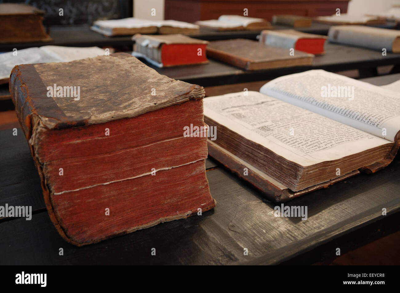 Thick old textbooks on the tables in the classroom Stock Photo - Alamy