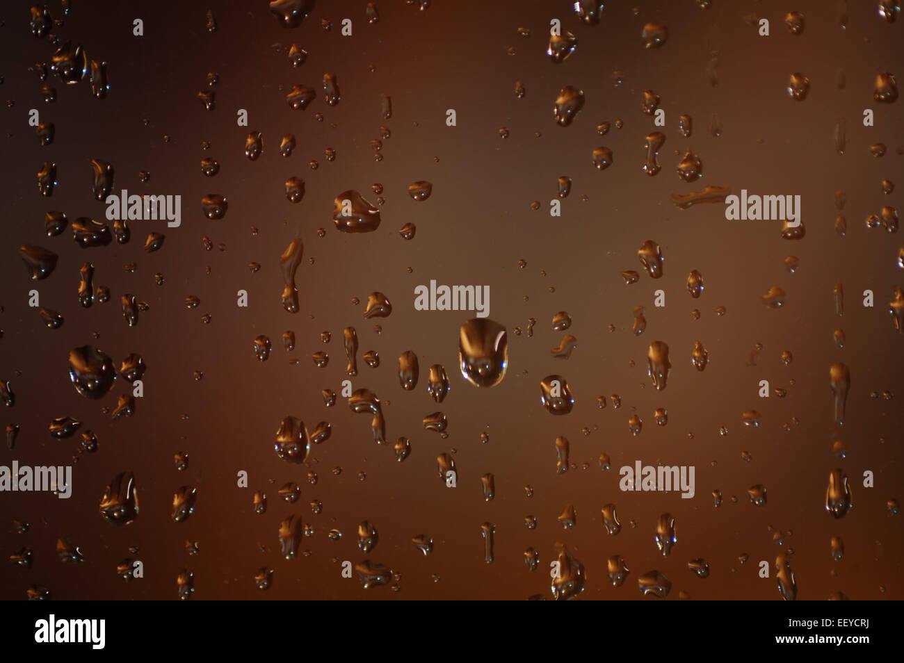 Golden drops on the glass Stock Photo - Alamy