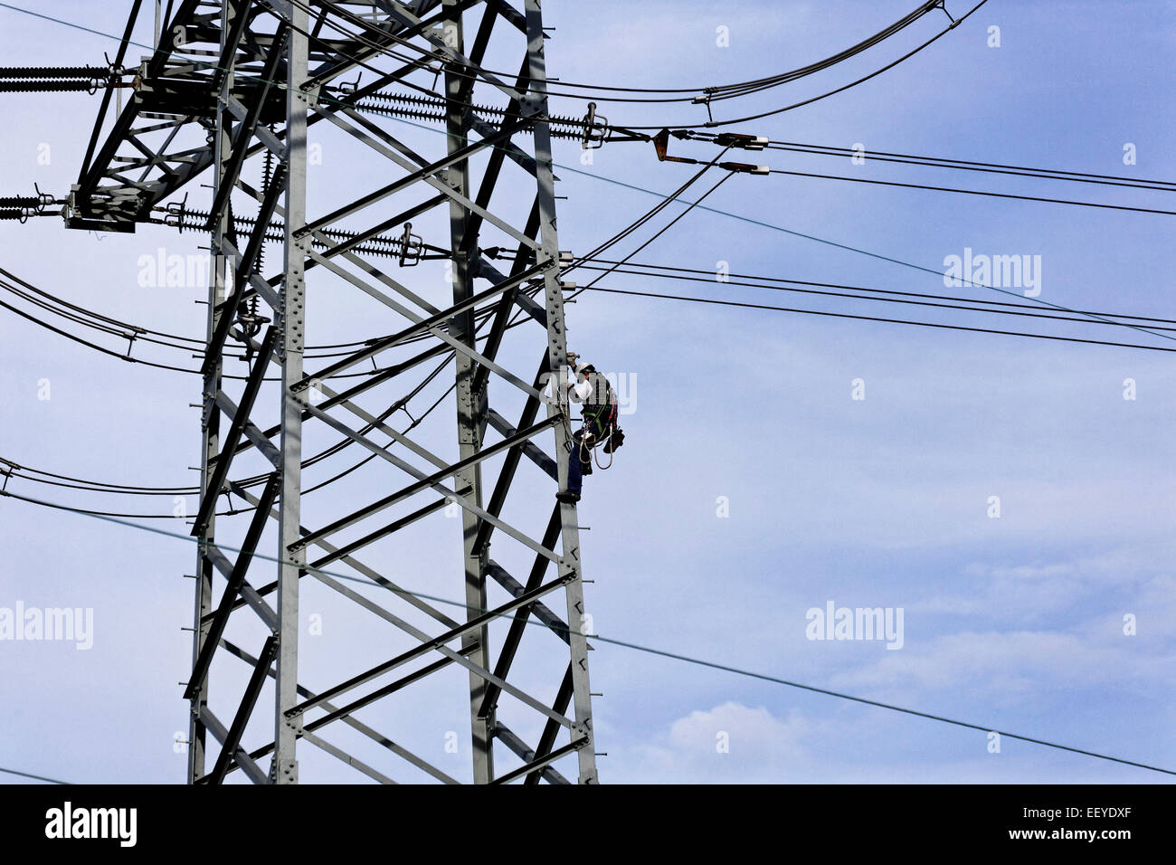 Fitter on Pylon Stock Photo - Alamy