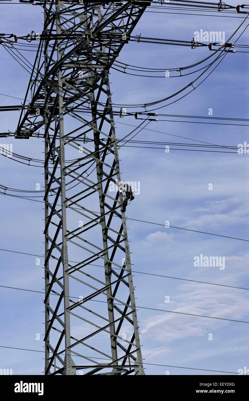 Fitter on Pylon Stock Photo - Alamy