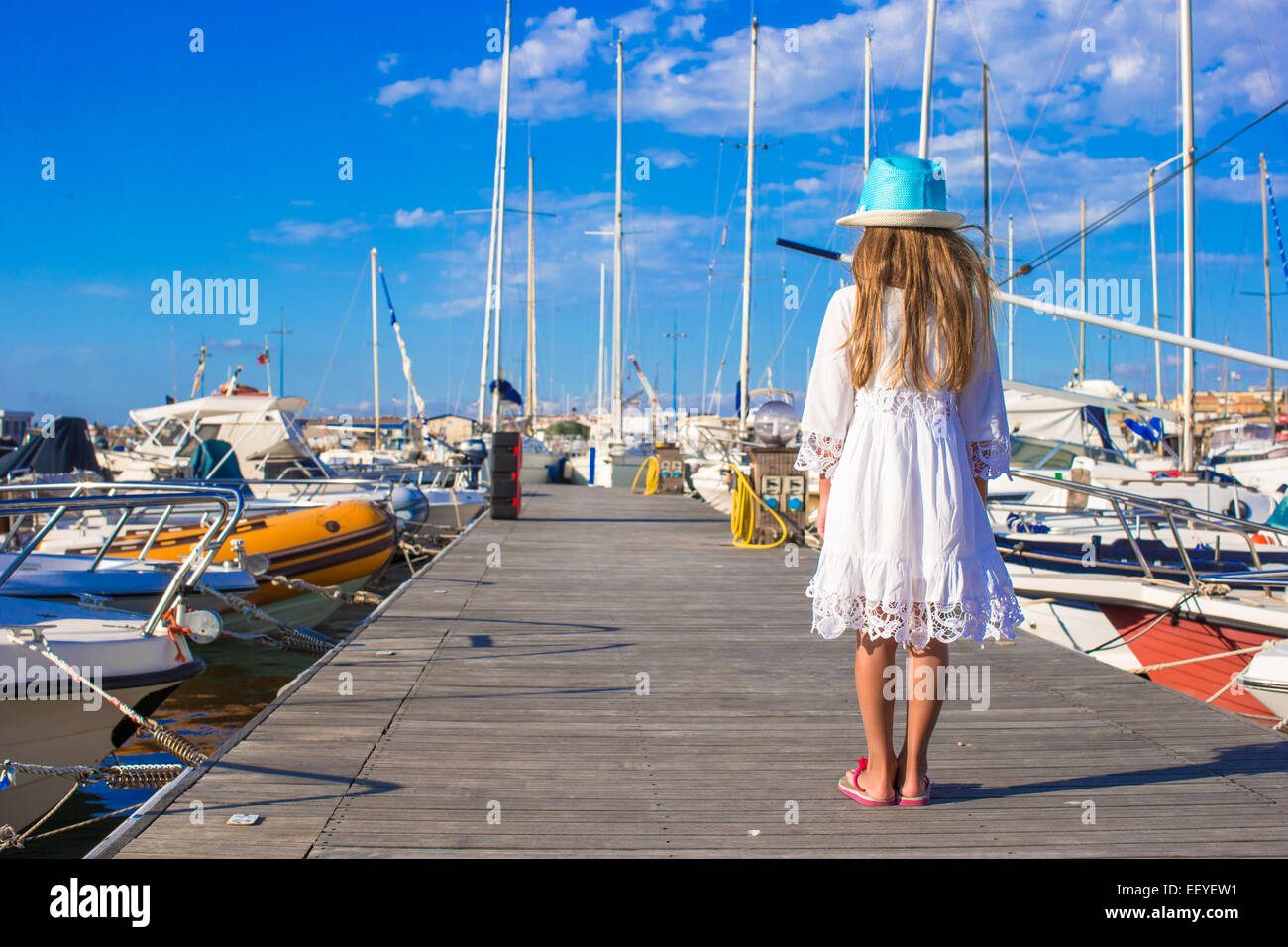 Adorable little girl have fun in a port on summer day Stock Photo - Alamy