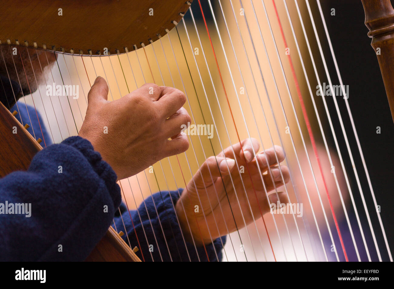 Plucking an instrument hi-res stock photography and images - Alamy