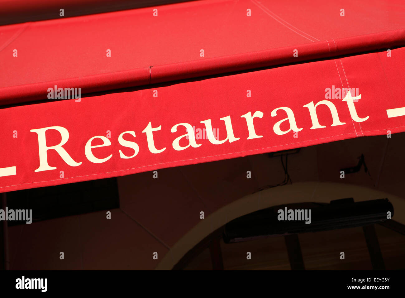 Bright red restaurant entrance canopy in Paris Stock Photo - Alamy