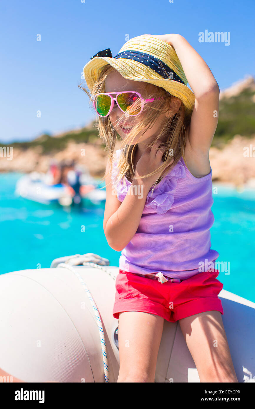 Cute little girl enjoying sailing on boat during summer vacation Stock ...