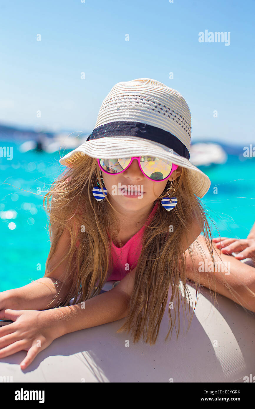 Cute little girl enjoying sailing on boat in the open sea Stock Photo ...
