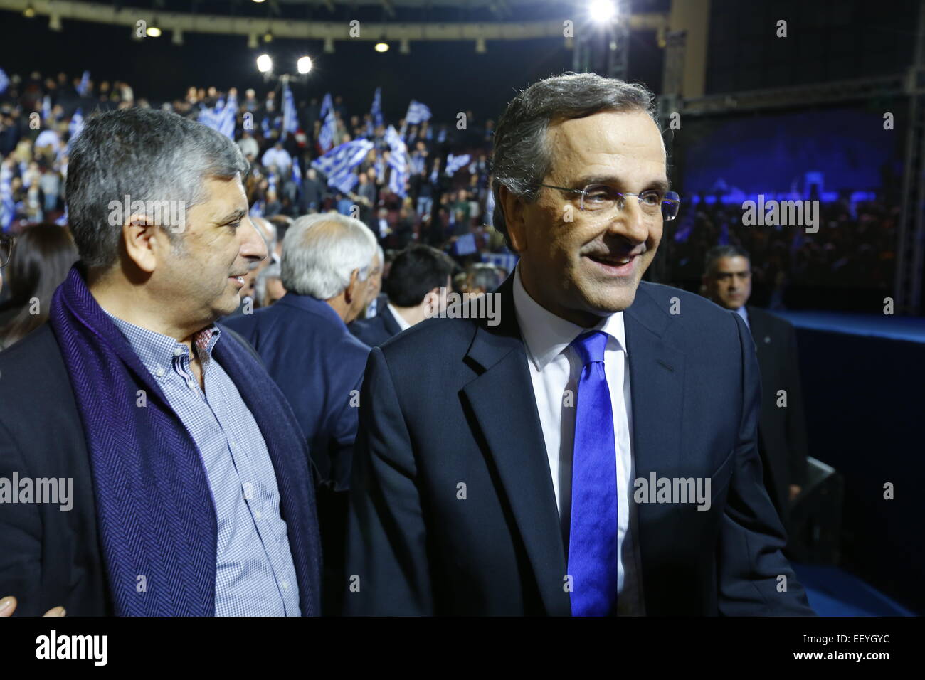 Greek Prime Minister Antonis Samaras (right) walks through the crowd ...