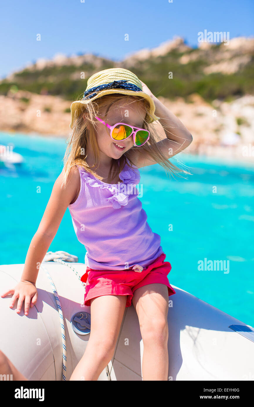 Cute little girl enjoying sailing on boat during summer vacation Stock ...