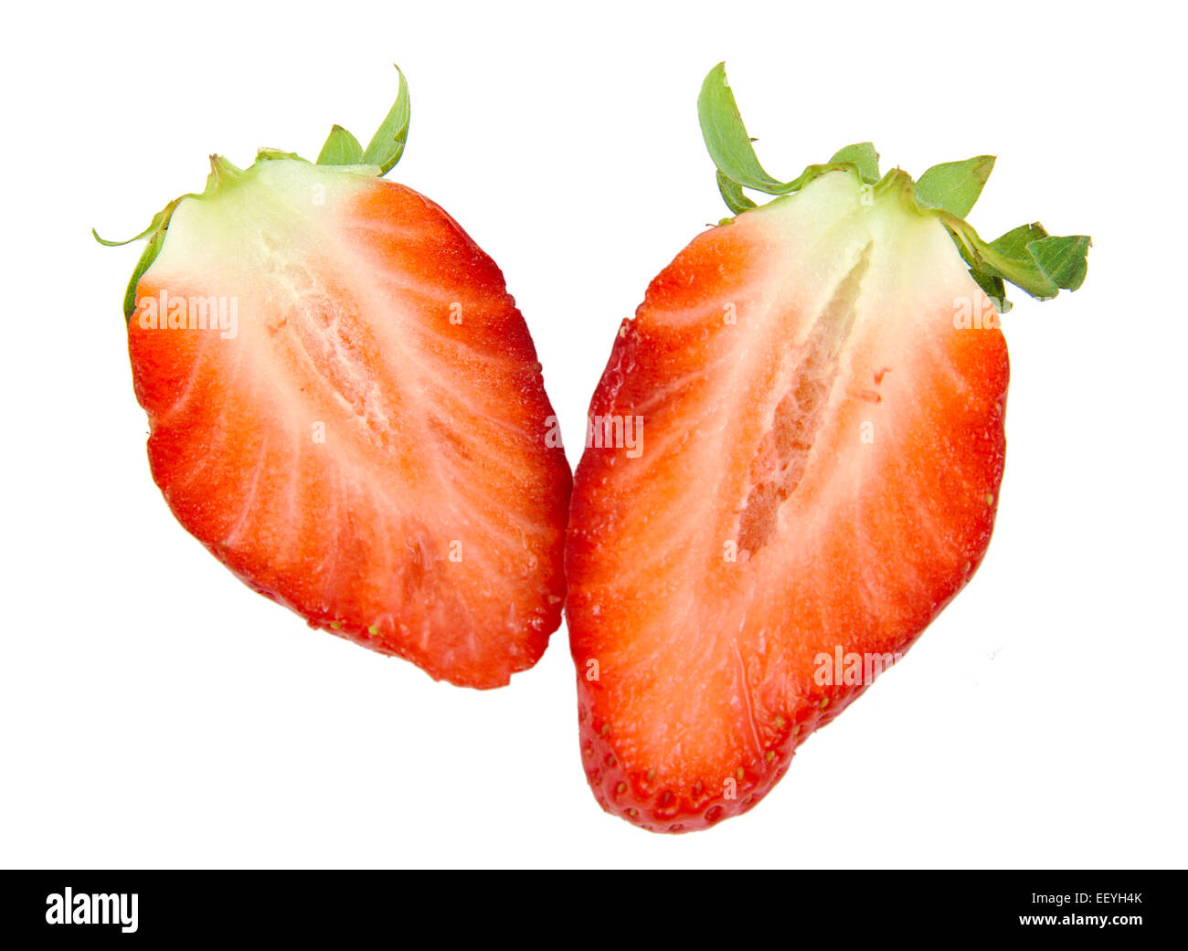 Two strawberry halves isolated on white Stock Photo - Alamy
