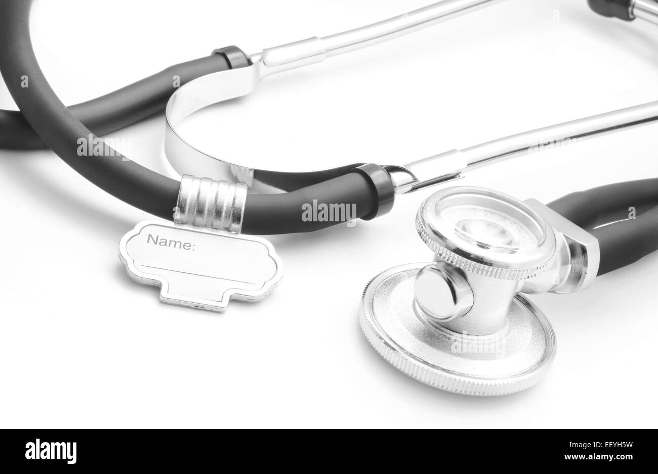 Stethoscope with tag on white Stock Photo - Alamy