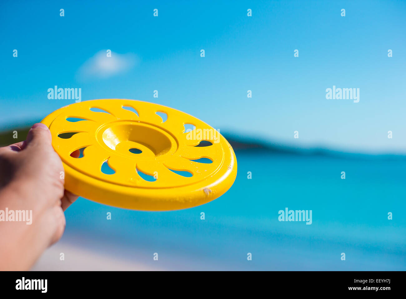 Close up frisbee background a tropical beach and sea Stock Photo - Alamy