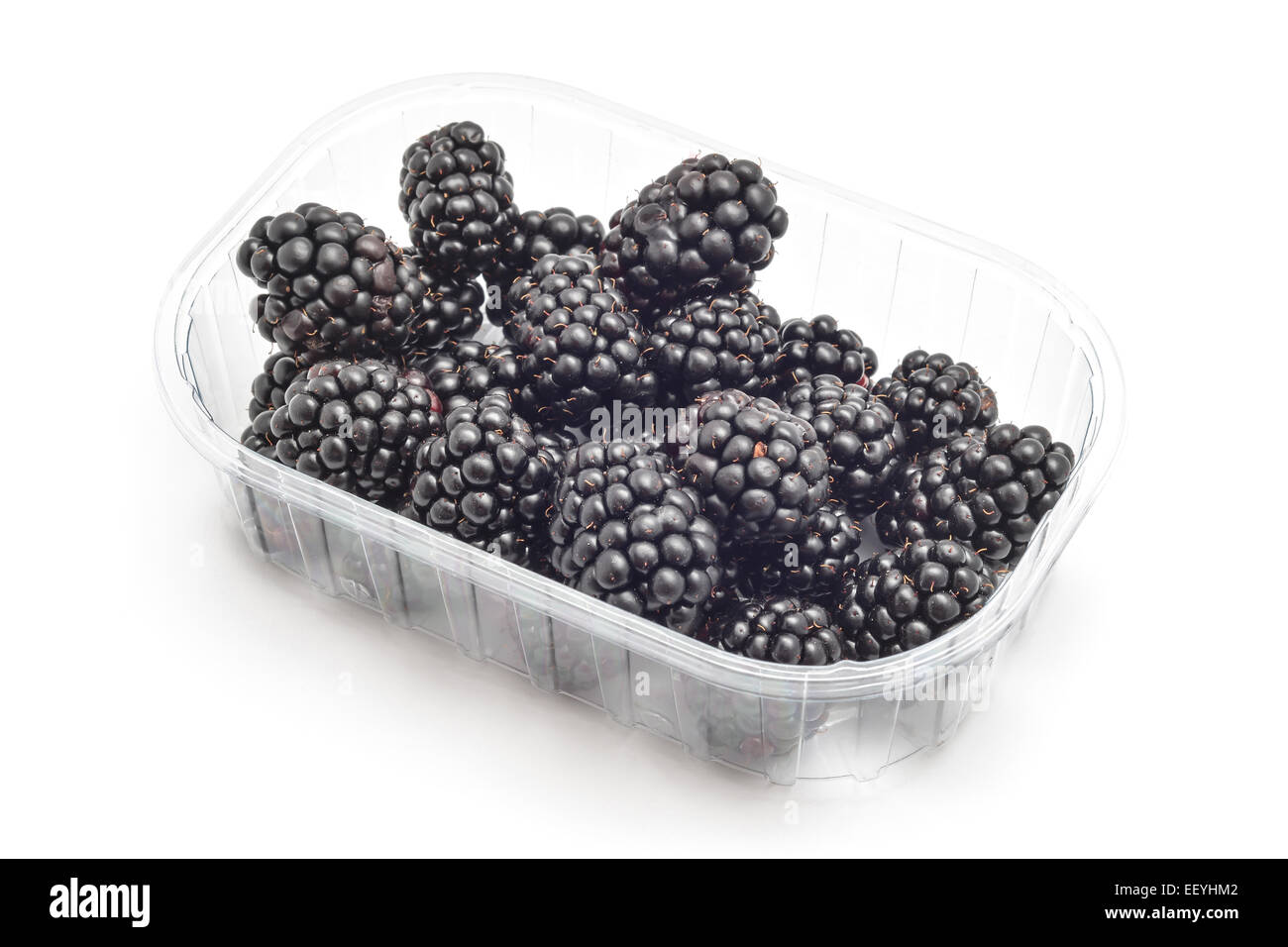 blackberries pack on white closeup Stock Photo - Alamy