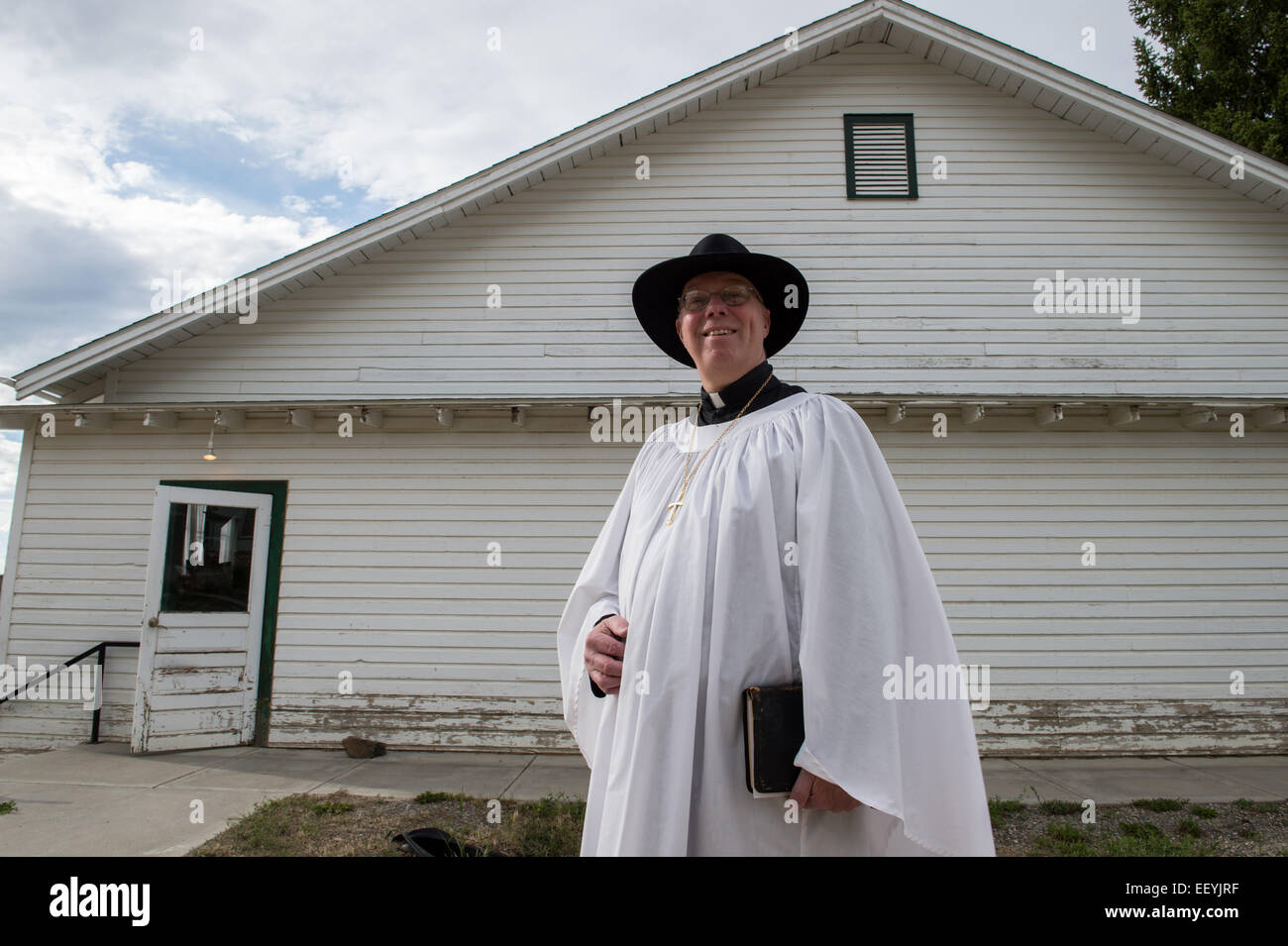 St. Paul’s Episcopal Church rector Keith Axberg leads a promenade of ...