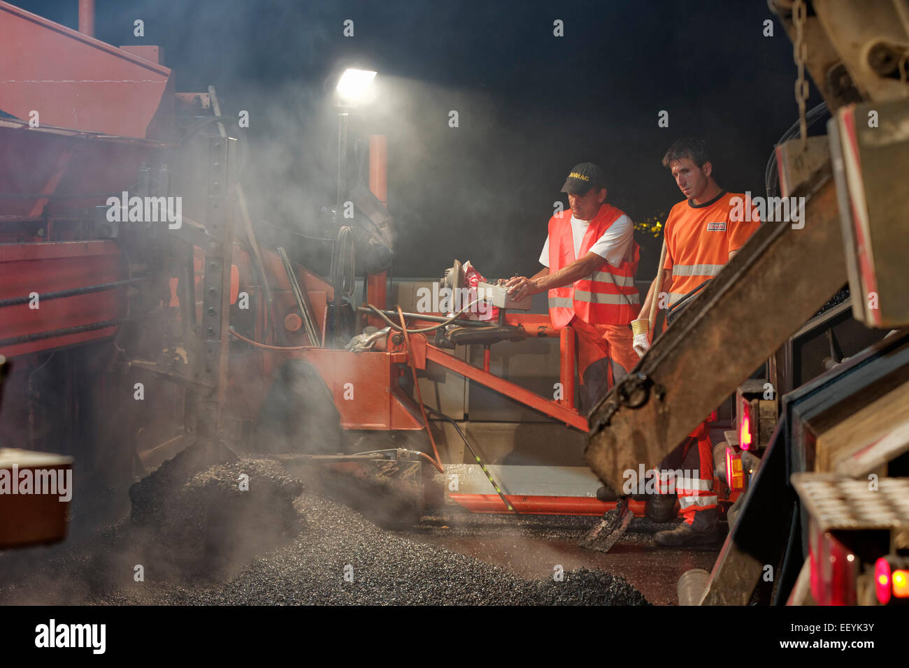 Highway construction site at night Stock Photo - Alamy