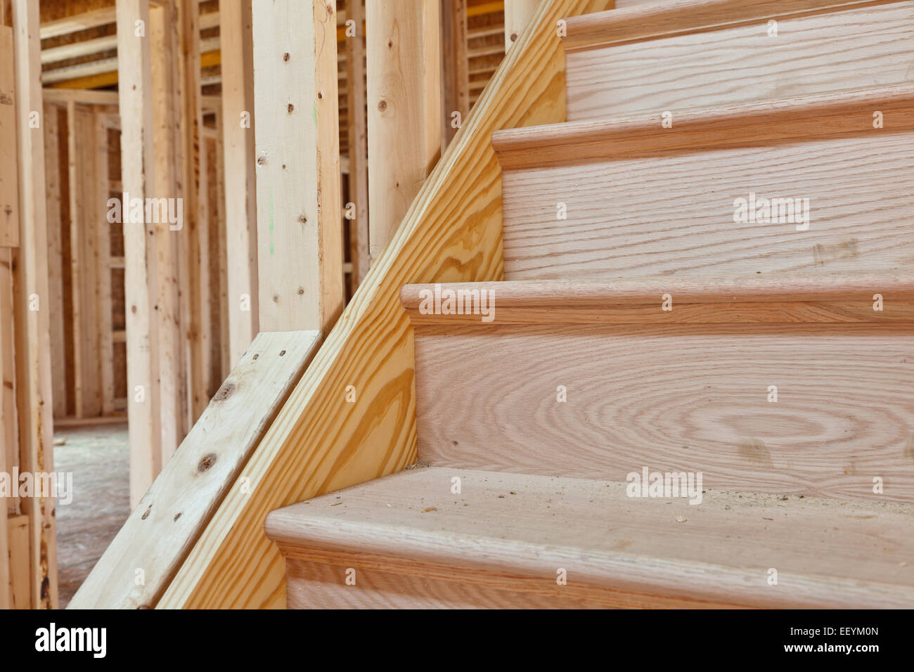 Installed new wood staircase in a home under construction Stock Photo ...