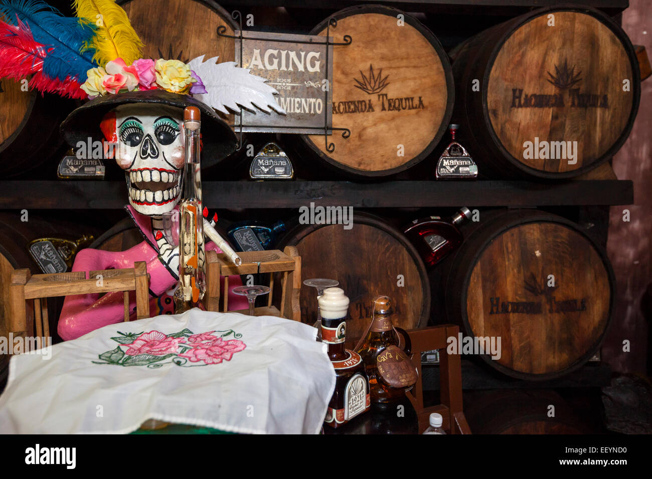 Catrina Skeleton Figure on Display by Aging Barrels of Tequila, Tequila ...