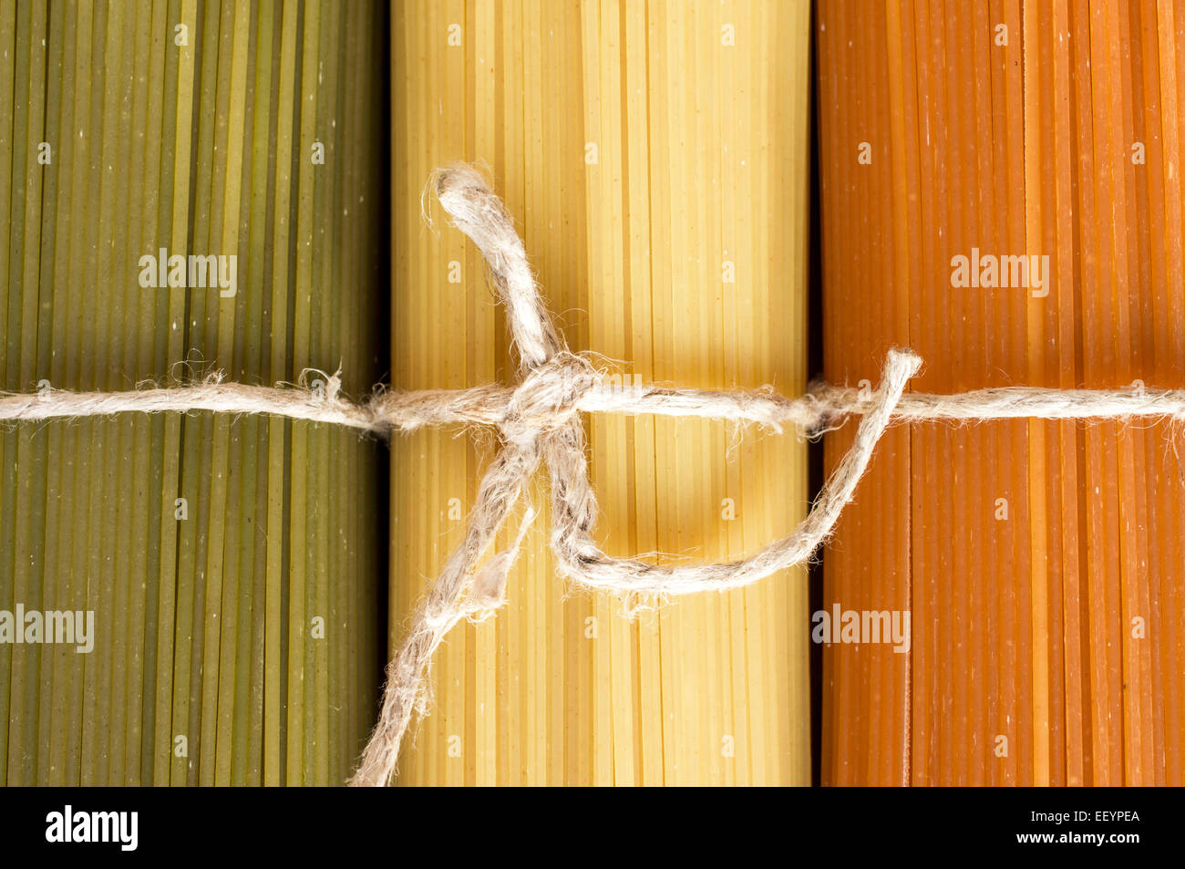 Spaghetti pasta in the colors of the Italian flag Stock Photo - Alamy