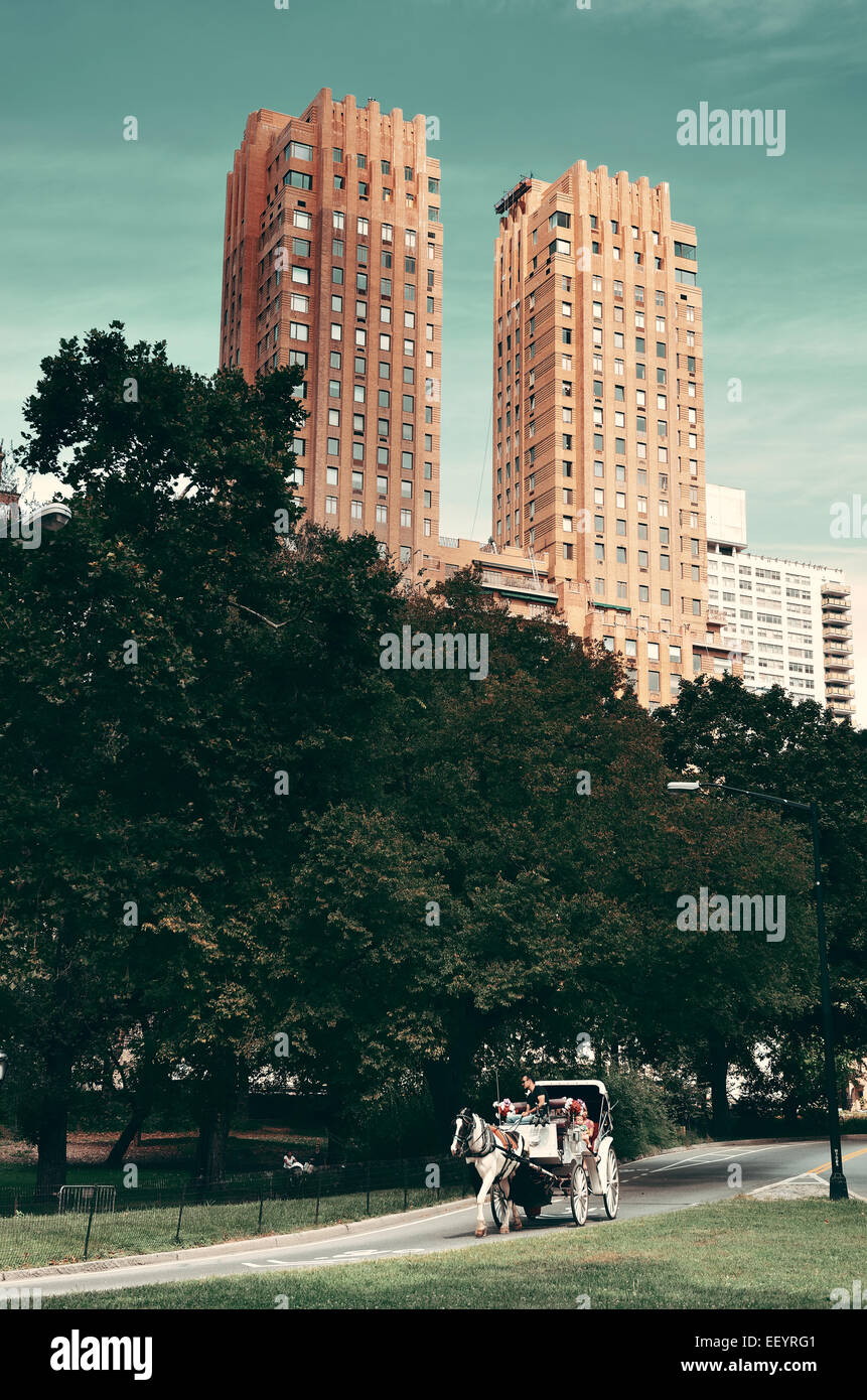 Central Park Spring and horse carriage in midtown Manhattan New York ...