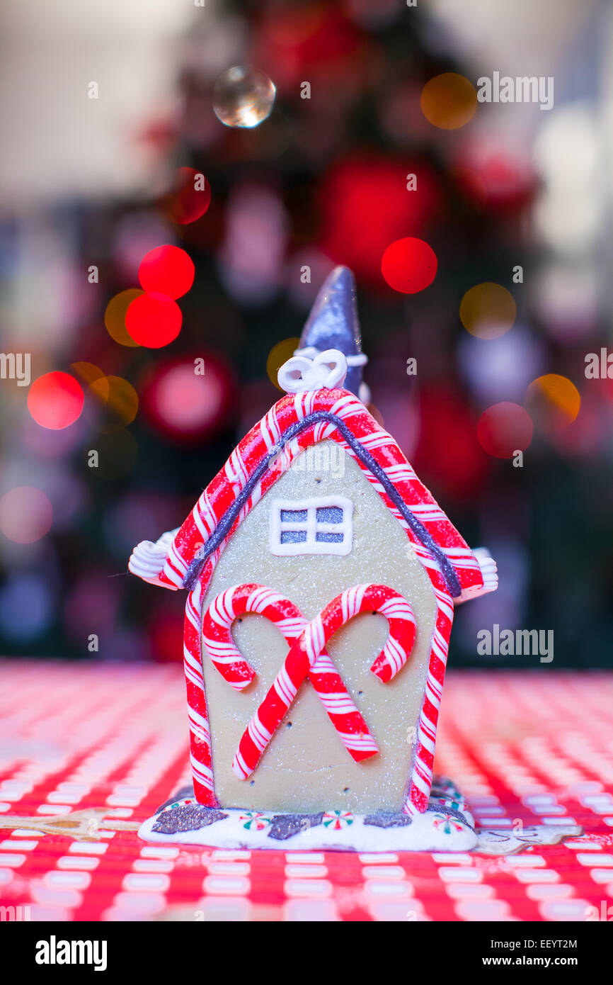 Gingerbread fairy house decorated with colorful candies of bright ...