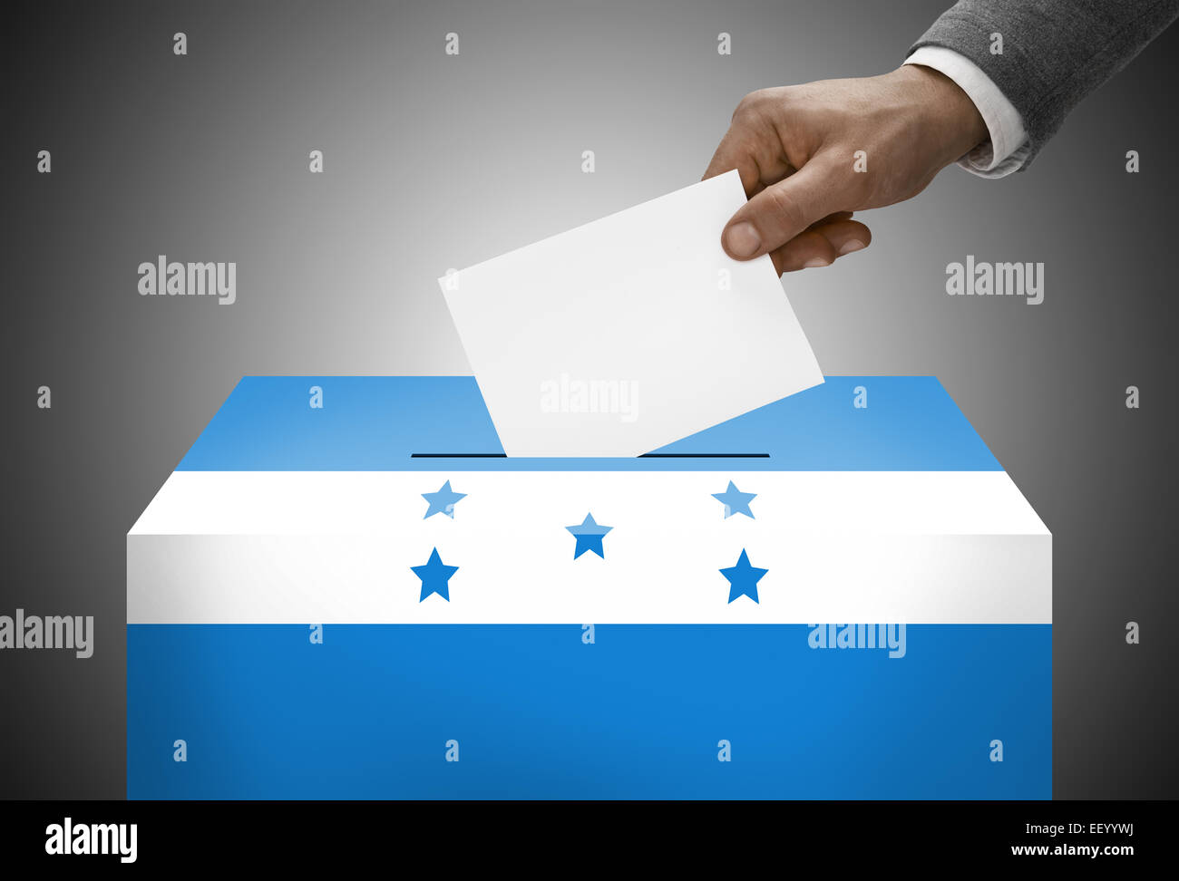 Ballot box painted into national flag colors - Honduras Stock Photo - Alamy