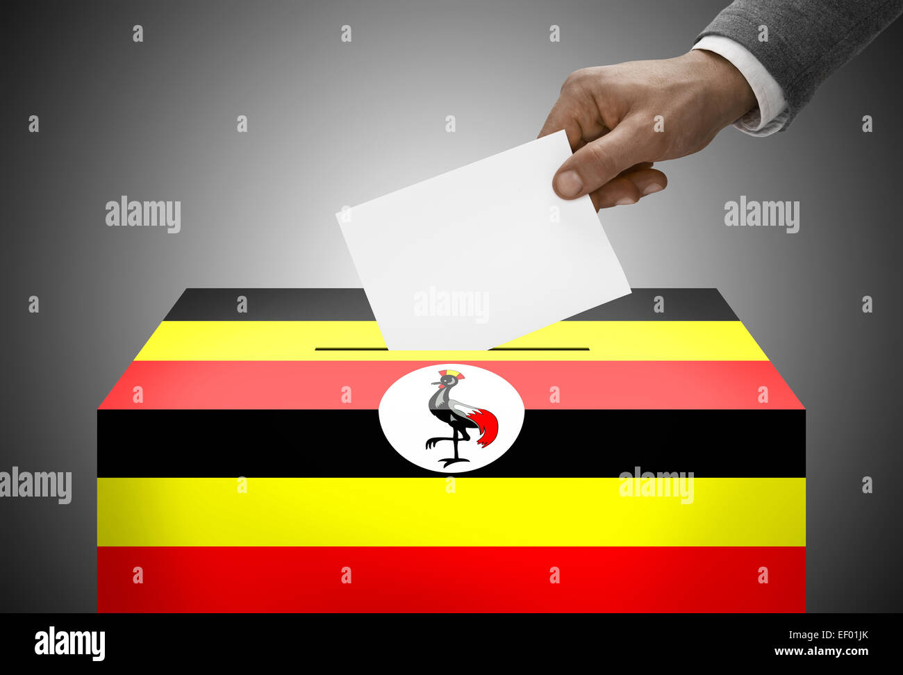 Ballot box painted into national flag colors - Uganda Stock Photo - Alamy