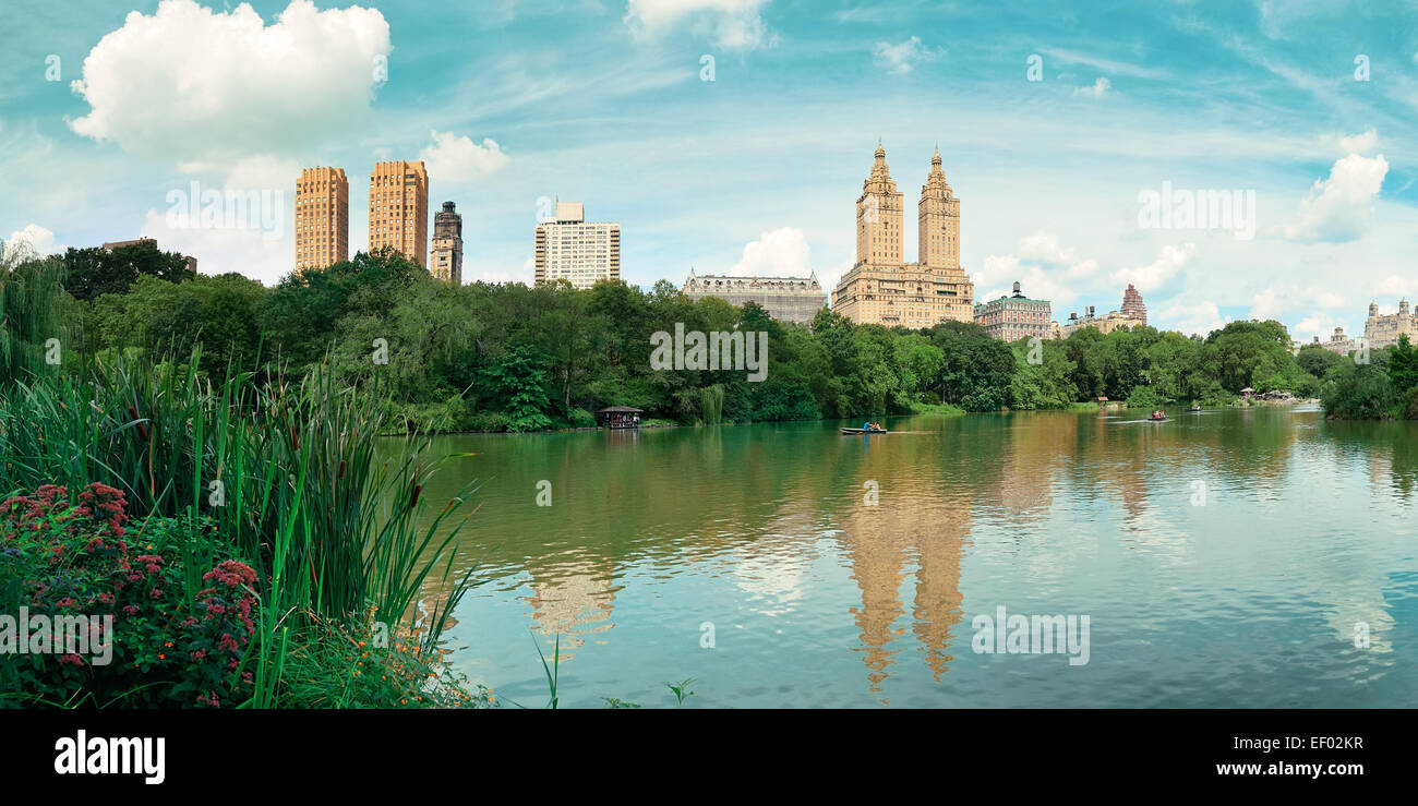 Central Park Spring with skyline panorama in midtown Manhattan New York ...
