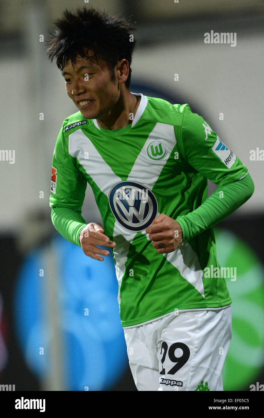 Wolfsburg, Germany. 23rd Jan, 2015. Wolfsburg's Xizhe Zhang walks ...