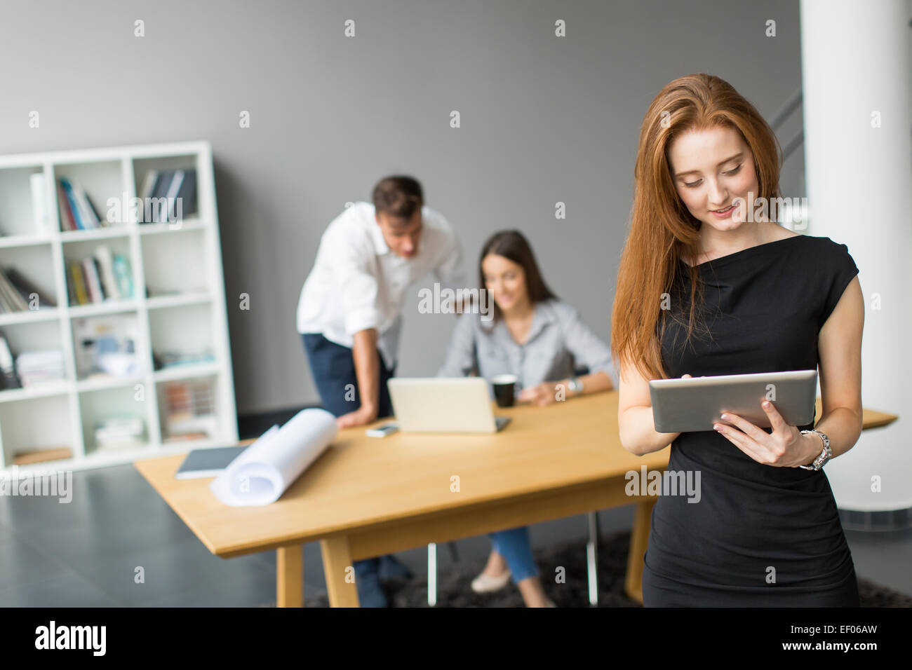 Young people in the office Stock Photo - Alamy