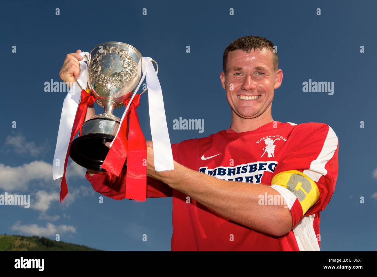 Bute captain Iain Macdonald with the Balliemore Cup 2013 after the ...