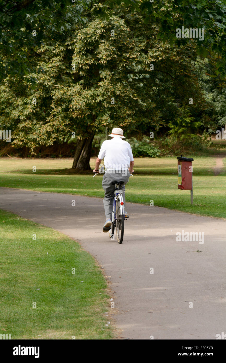 Elderly man cycling hi-res stock photography and images - Alamy