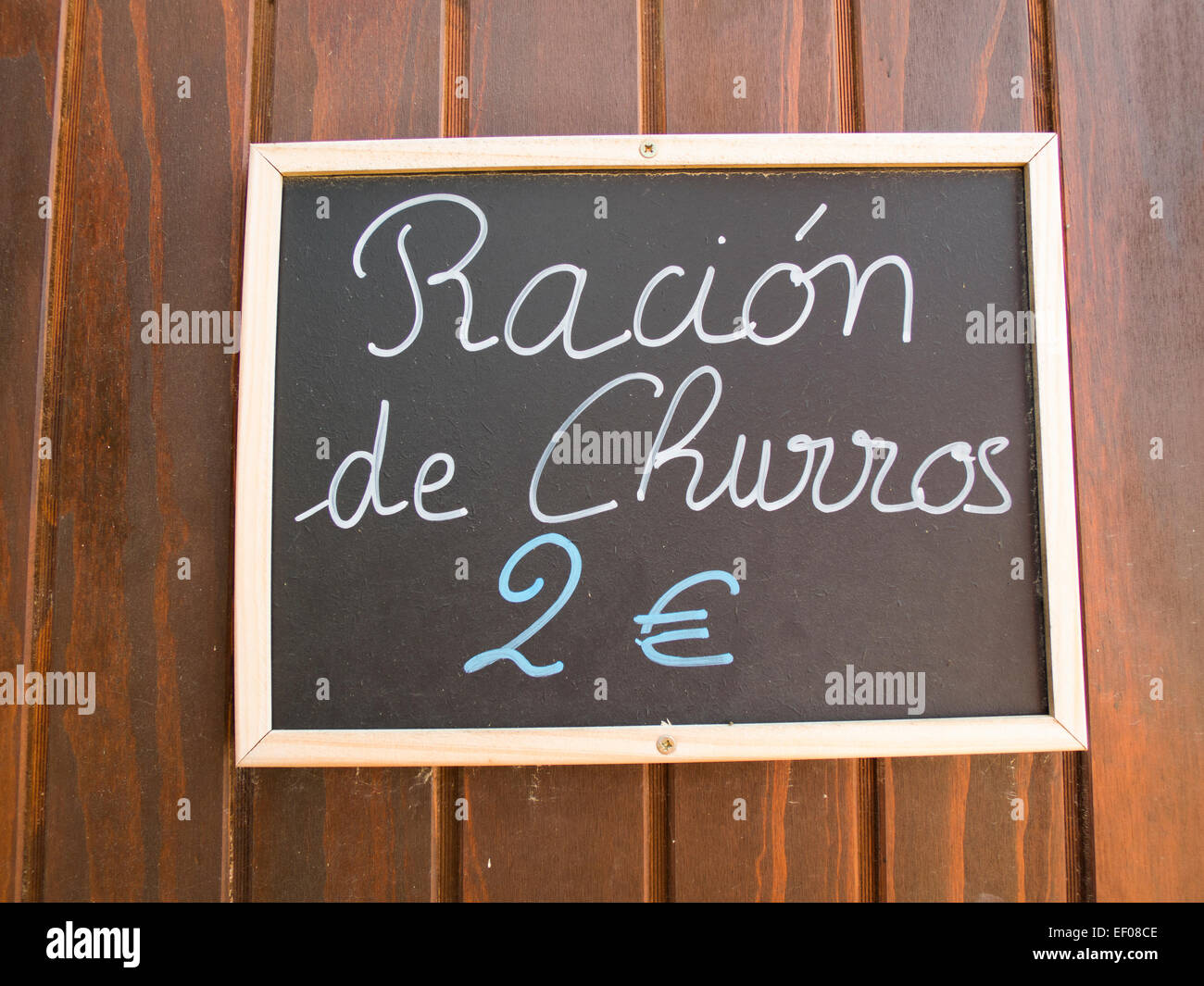 black placard spanish white handwritten in wall with typical menu food ...