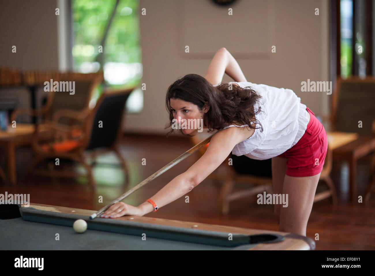 Woman pool cue hi-res stock photography and images - Alamy