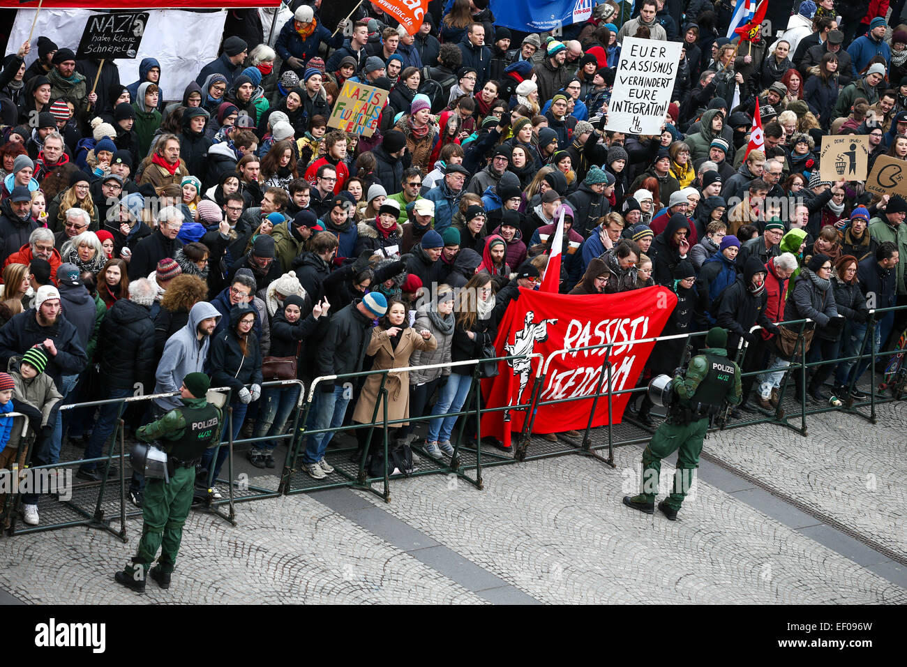 Bamberg, Germany. 24th Jan, 2015. Demonstrators hold high signs saying ...