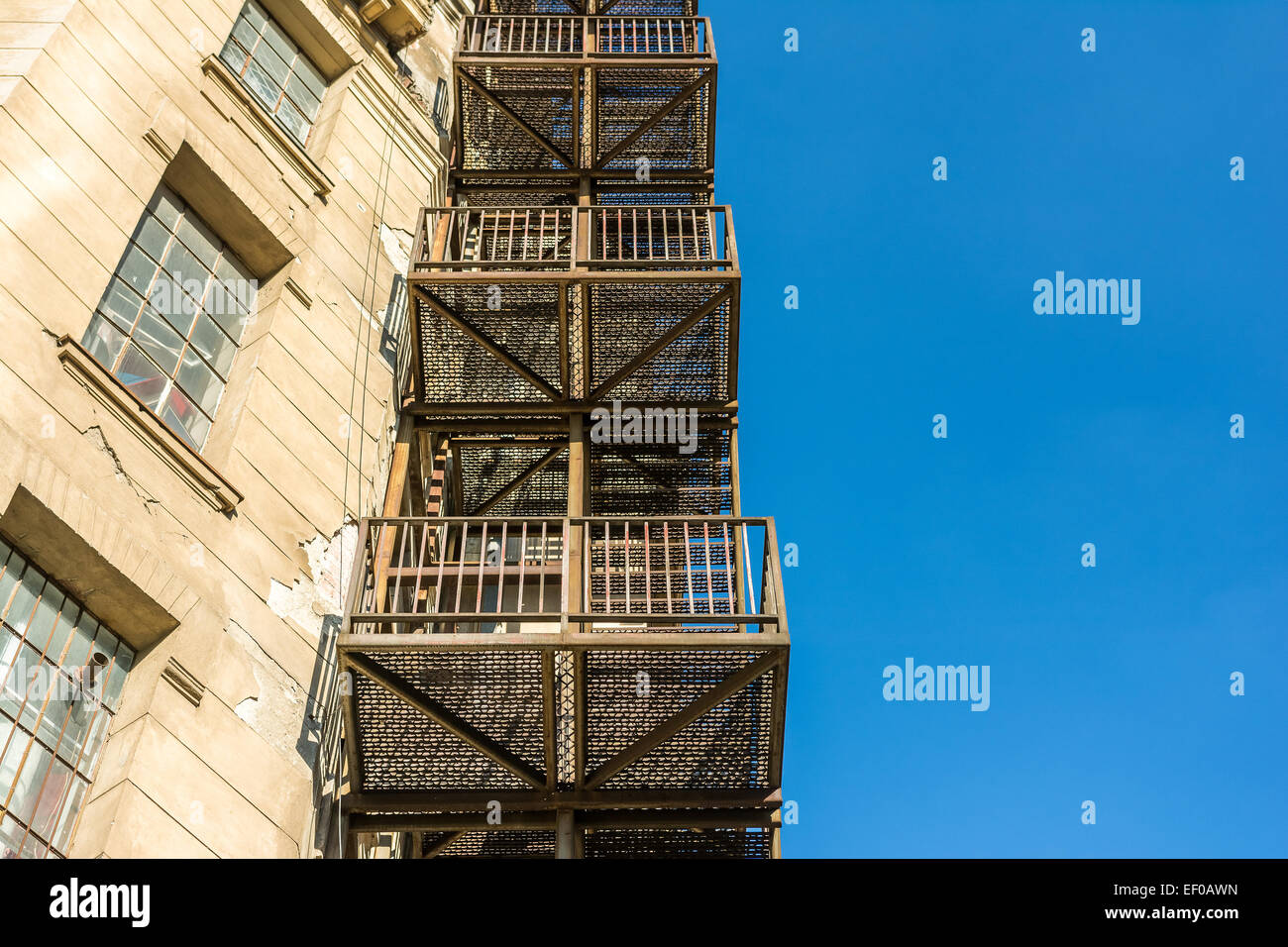 Metal Fire Escape Stairs On Old Building Facade Stock Photo - Alamy