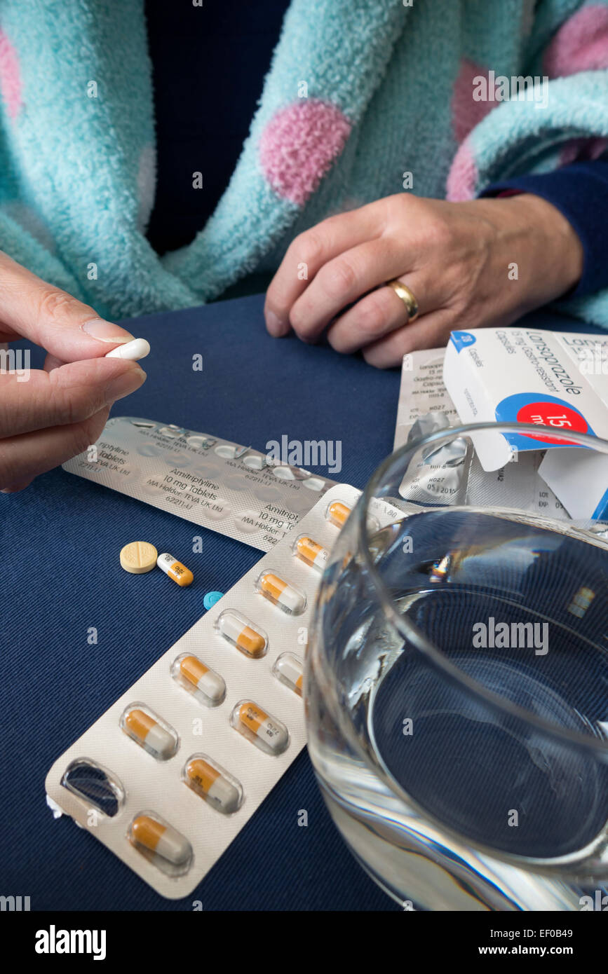healthcare medicine taking tablet Stock Photo - Alamy