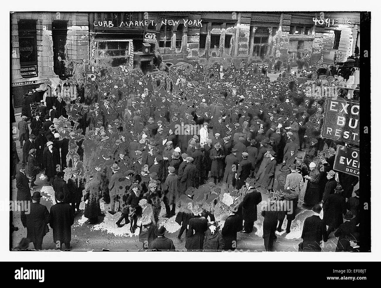 This image captures a busy curb market in New York, depicting a ...