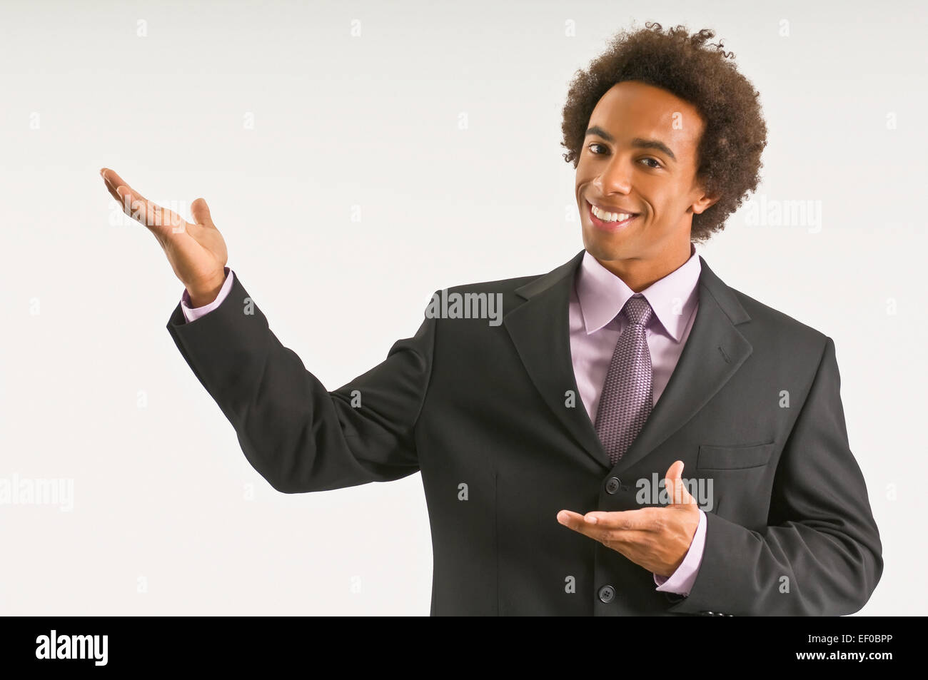 Businessman gesturing with his hands Stock Photo - Alamy