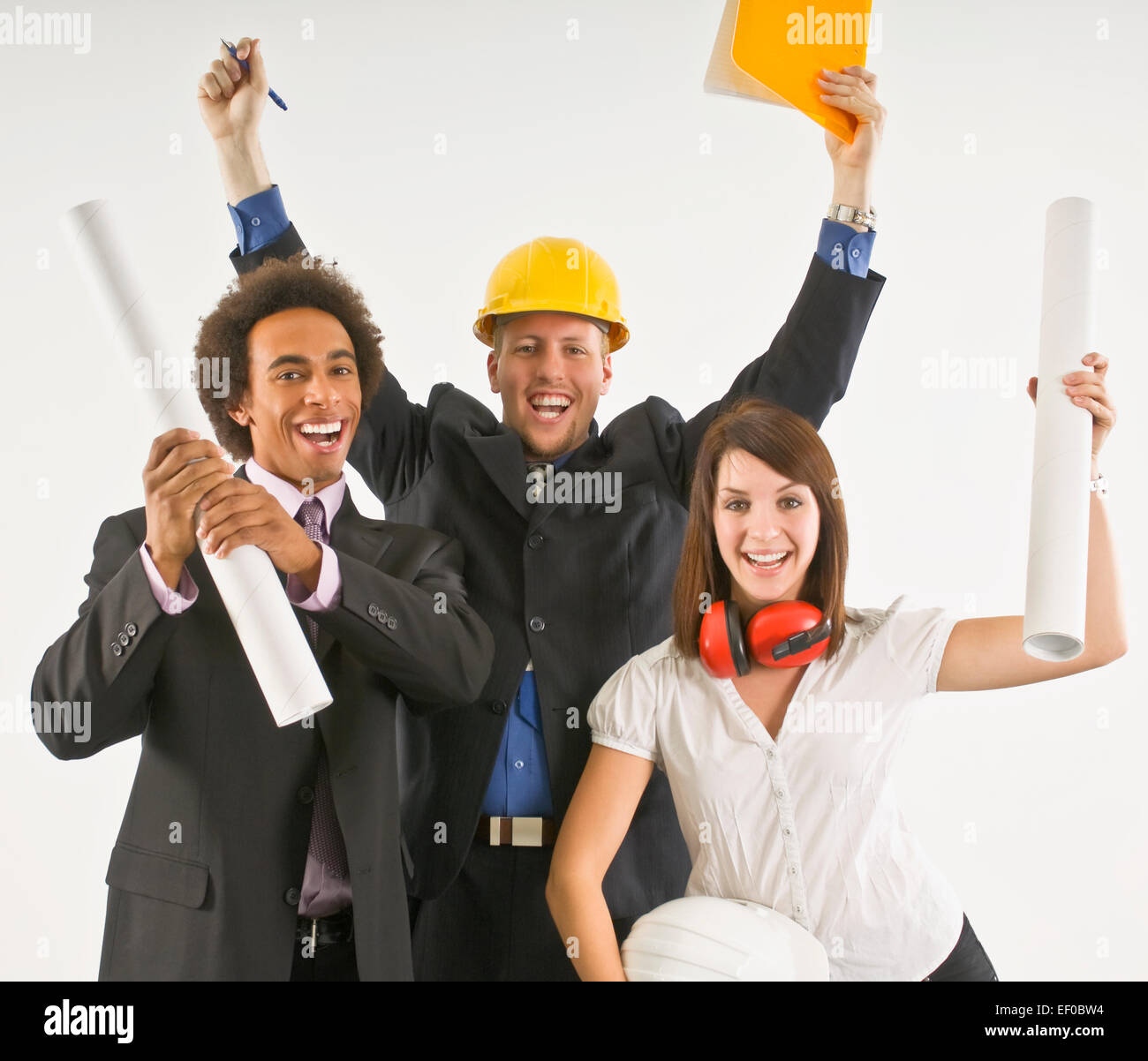 Three excited business people cheering Stock Photo - Alamy