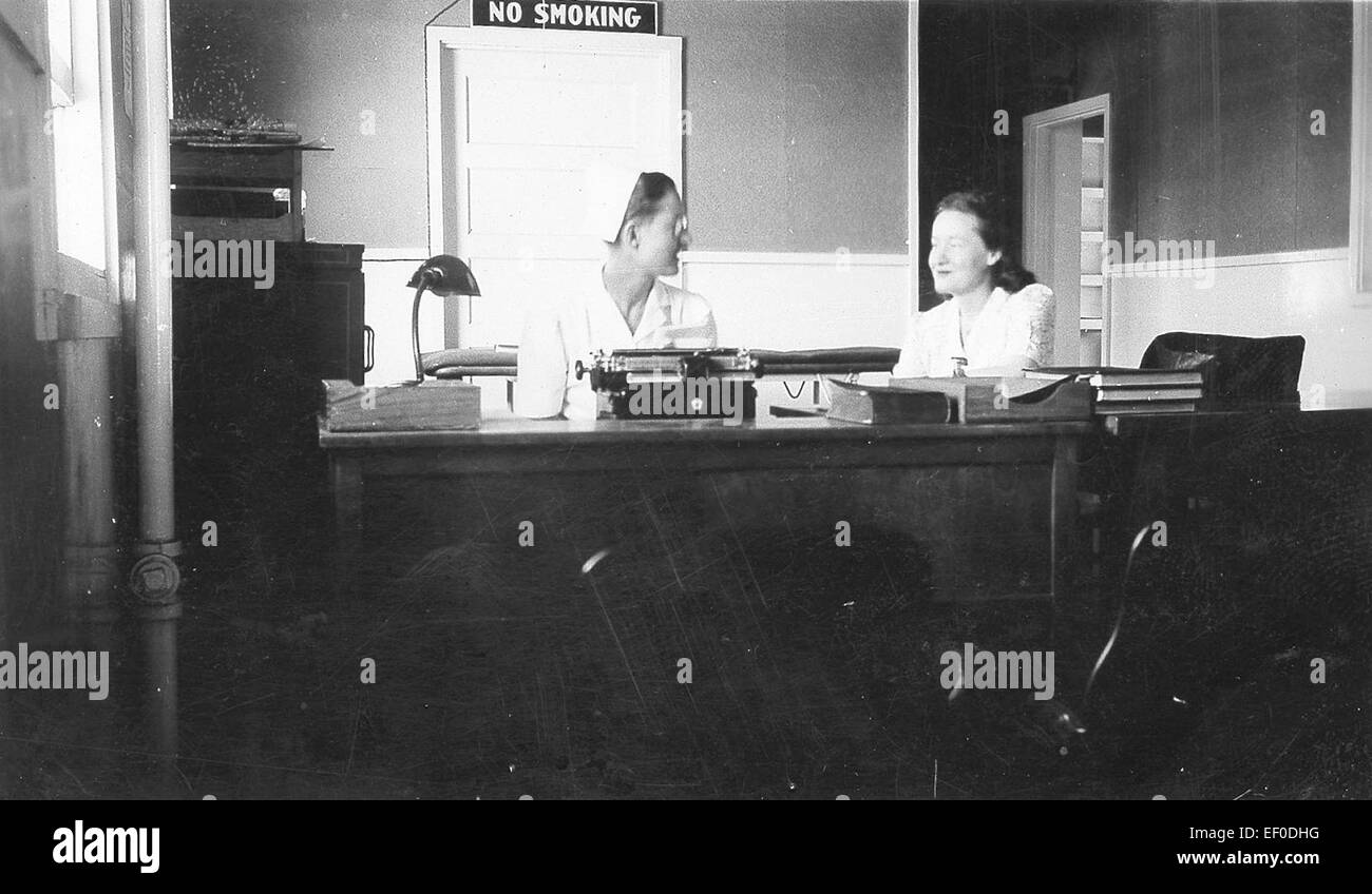 A photograph of Nurse Gwen Collip (right) with a colleague, both ...
