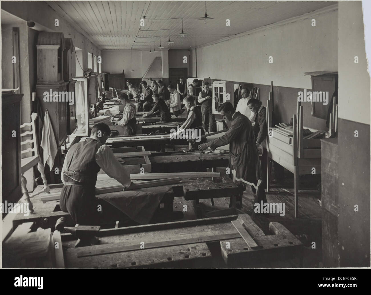 A woodworking class, where students learn the techniques and skills ...