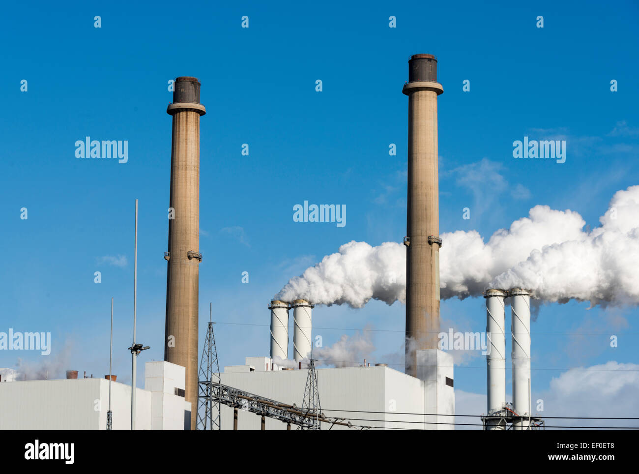 industrial chimney with lot of environment pollution Stock Photo - Alamy