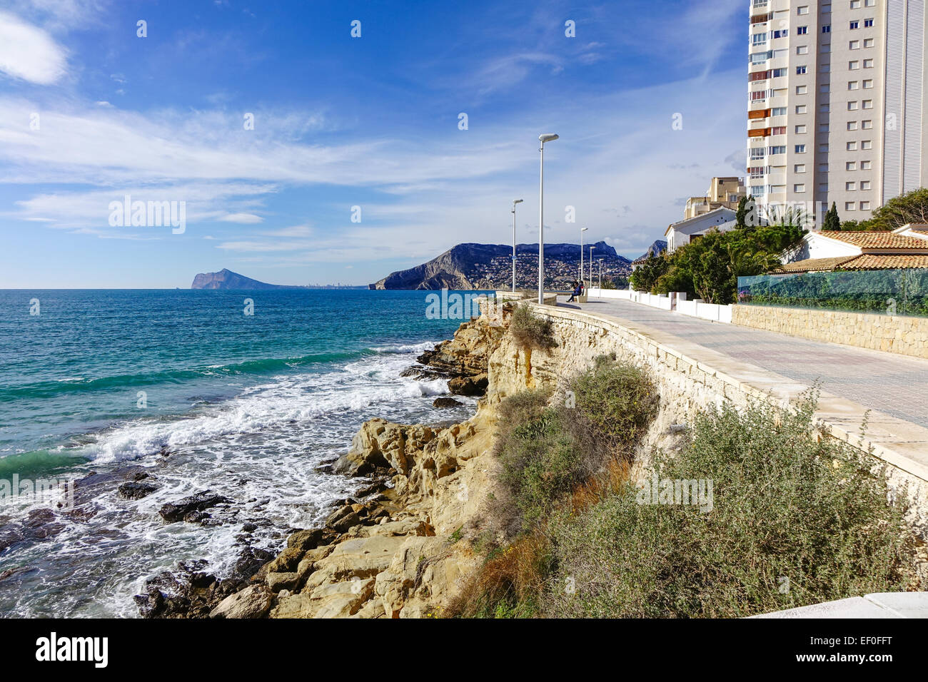 Calpe, Costa Blanca, Spain, with Benidorm in the far distance between ...