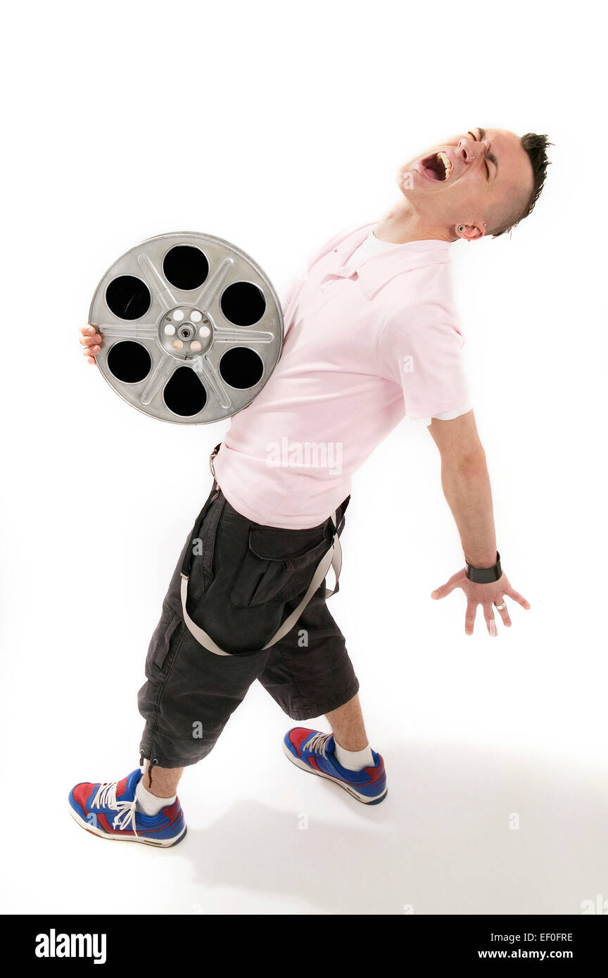 Man screaming while holding a 35mm film reel Stock Photo - Alamy