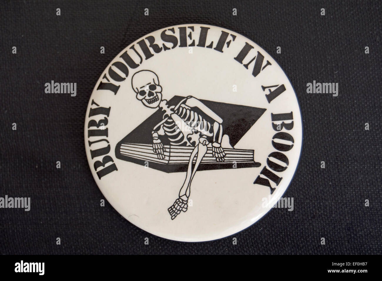 bury yourself in a book badge, part of a 1980s british campaign to encourage reading Stock Photo ...
