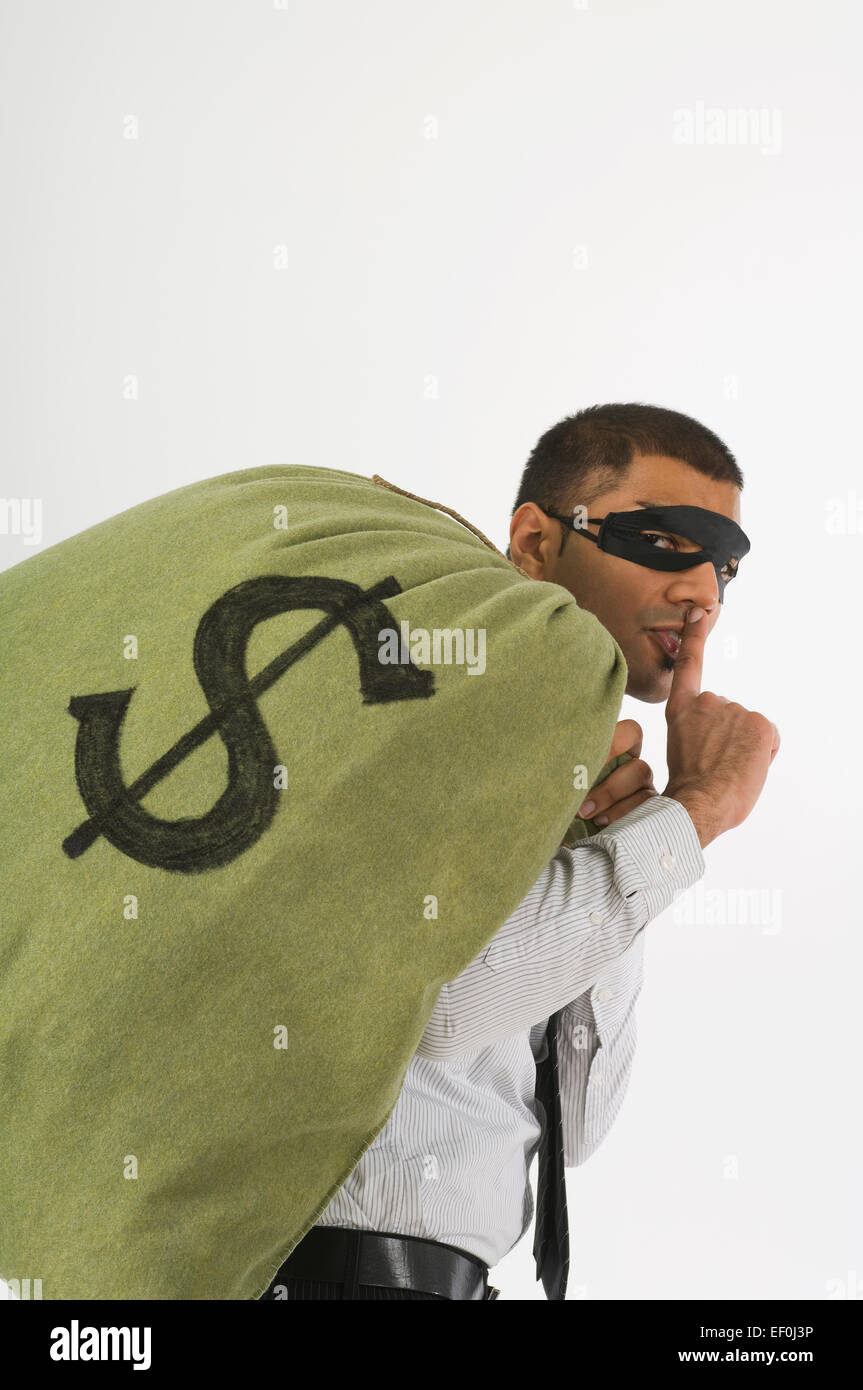 Man carrying bag money hi-res stock photography and images - Alamy