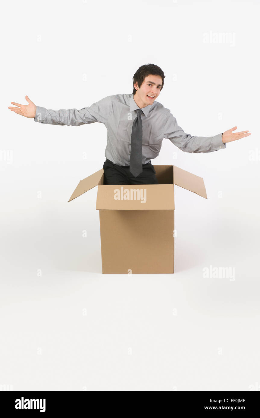Businessman inside a box Stock Photo - Alamy