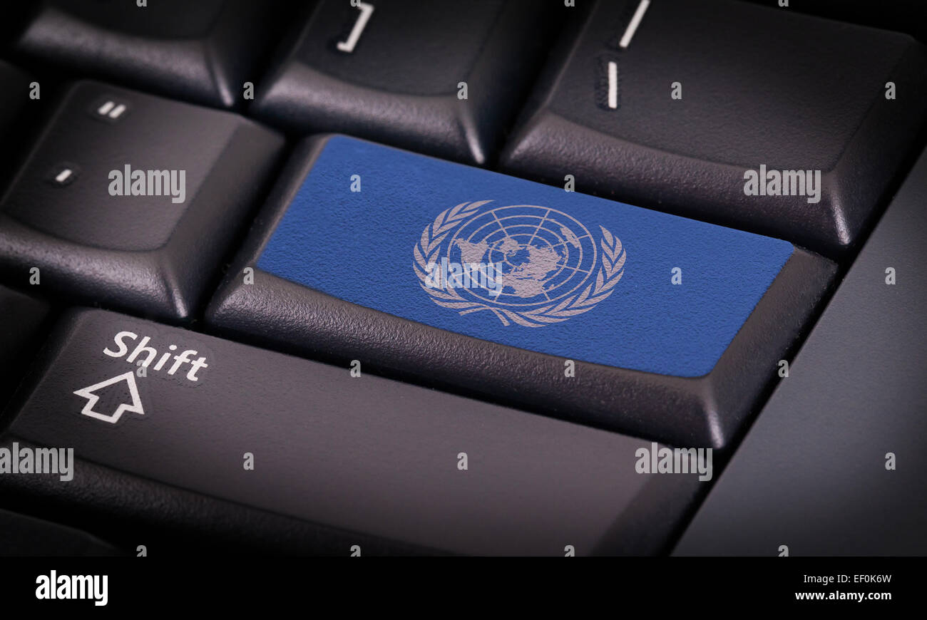 Symbol on button keyboard, blue United Nations button Stock Photo - Alamy