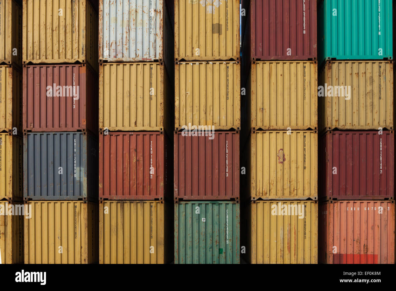 Stacked Shipping Containers in various colours Stock Photo - Alamy