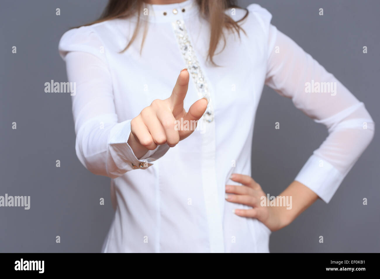 woman in front of visual touch screen Stock Photo - Alamy